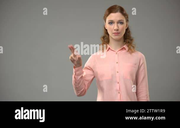 Deaf woman saying no in sign language, teacher showing words in asl ...
