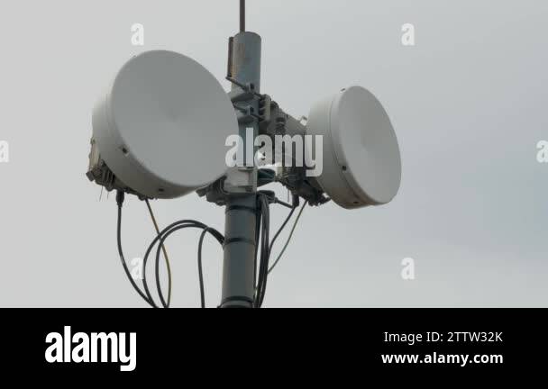 Transmitter signals. Telecommunication repeater antenna system. Tower ...