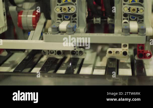 Robot play the piano, machine learning concept with artificial ...