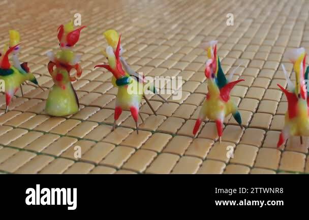 Tohe, the traditional toys in Vietnam made by colored rice powder Stock ...