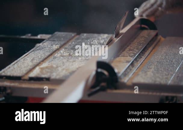 Process of cutting and splitting wooden plank with dangerous circular ...