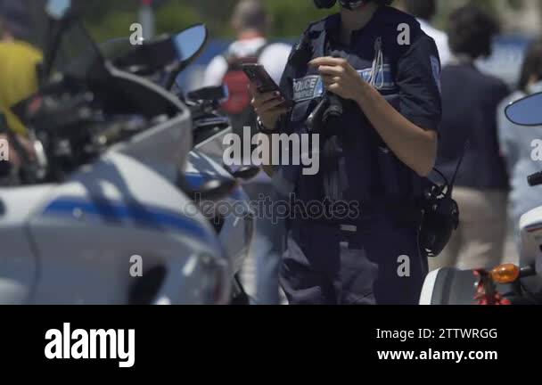 Municipal police officer checking Stock Videos & Footage - HD and 4K ...