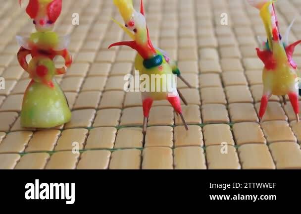 Tohe, the traditional toys in Vietnam made by colored rice powder Stock ...