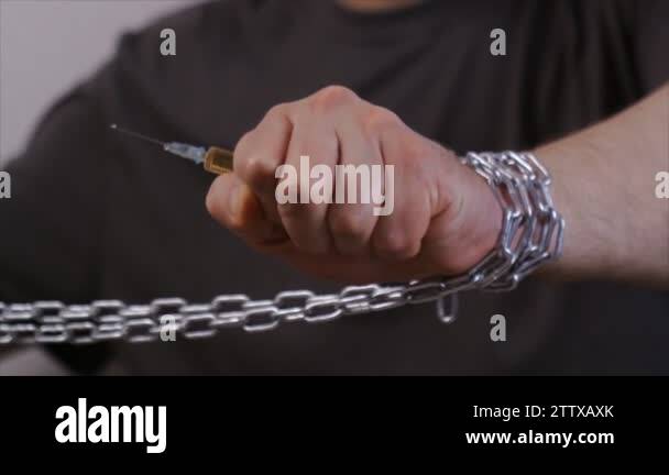 Chained hand Stock Videos & Footage - HD and 4K Video Clips - Alamy