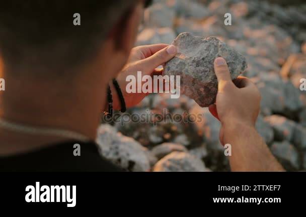 Man holding the stone Stock Videos & Footage - HD and 4K Video Clips ...