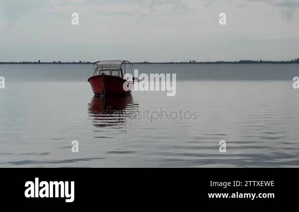 Boat alone on water Stock Videos & Footage - HD and 4K Video Clips - Alamy