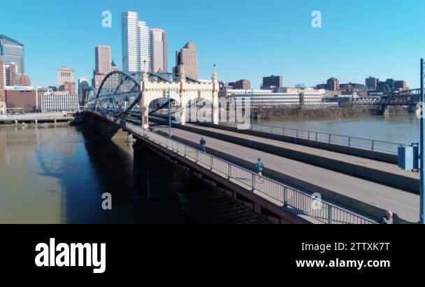 A slow forward aerial establishing shot of pedestrians and traffic on ...