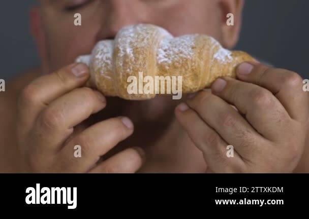 Binge eating man Stock Videos & Footage - HD and 4K Video Clips - Alamy