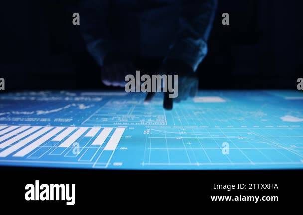 Man works charts, diagram indicators touch screen sensory interactive ...