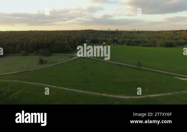 fly around the windmills in Pirogovo, 4k aerial view of old windmills ...