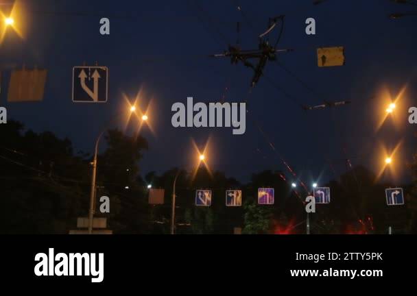 Blue road signs on night city street, traffic rules compliance, urban ...