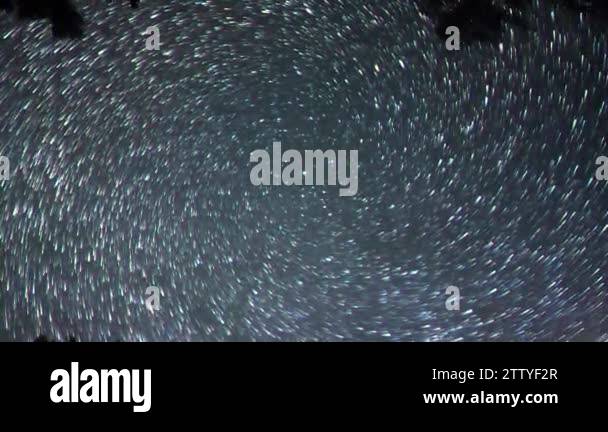 Glitch effect. Stars like meteors in a spiral. Time Lapse. Short tail ...