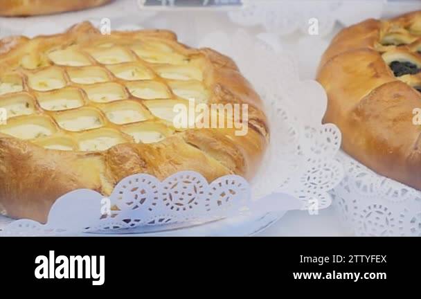 Showcase of cakes, pastry in window display canteen for tasty desert food Stock Video Footage ...