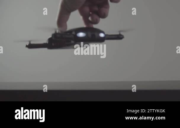 Futuristic transportation concept.Micro drone take off from laptop computer with virtual cockpit ...