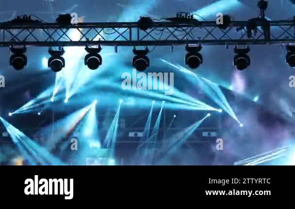 Stage lights at the concert with fog, Stage lights on a console ...