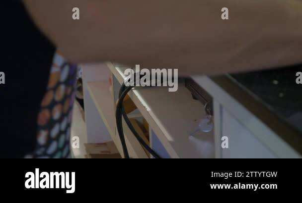 dispensing change from a register cash drawer giving coins and bills in ...