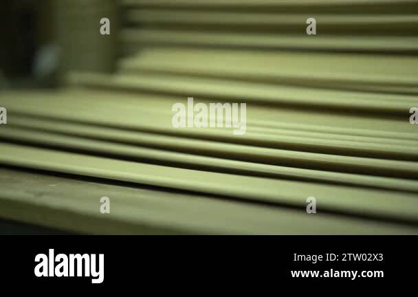 Shooting of gluing of a film on a plinth. The worker gives a plinth to ...