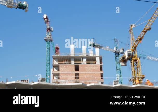 few heavy machinery industrial cranes working lifting equipment ...
