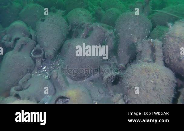 Underwater archeology: ancient Greek amphoras on the seabed Stock Video ...