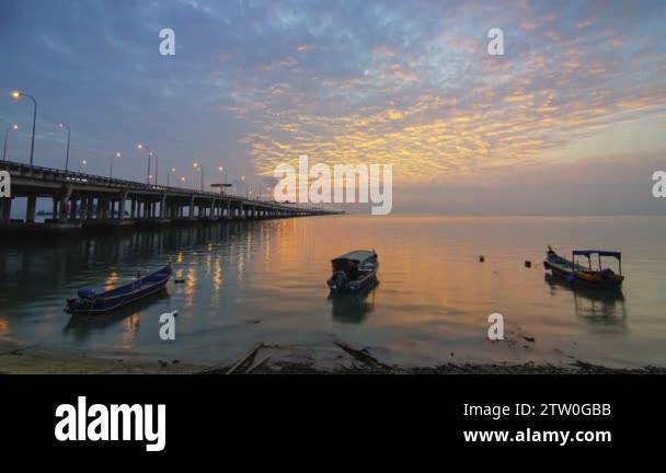 Timelapse Magic hour at the coastal of penang first bridge Stock Video ...