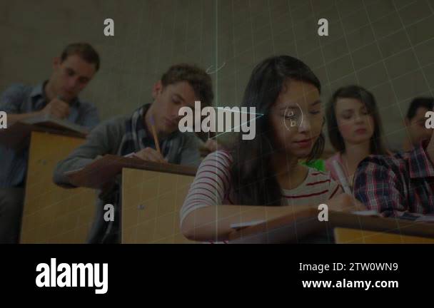 Digital composite of multi-ethnic students taking a notes in auditorium ...