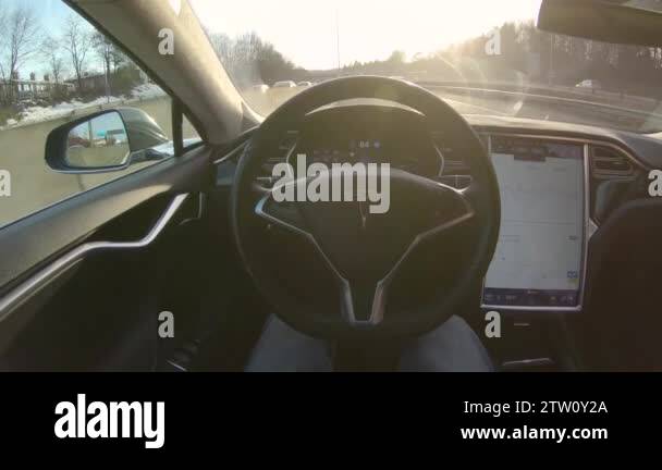 TESLA AUTONOMOUS CAR, MARCH 2018: POV, LENS FLARE: Commuter on way to ... TESLA AUTONOMOUS CAR, MARCH 2018: POV, LENS FLARE: Commuter on way to ...