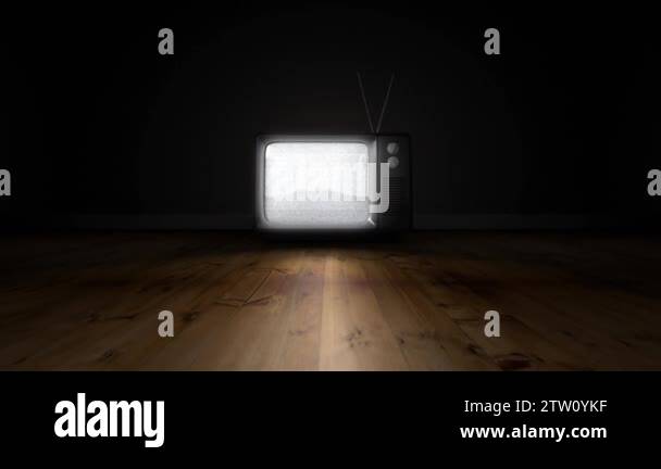 Digital composite of TV that lights up on dark room with wood on floor ...