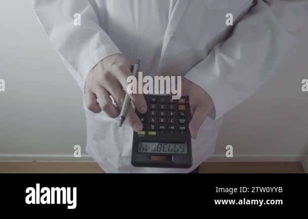 Healthcare costs and fees concept.Hand of smart doctor used a ...