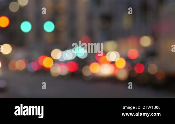 City at night background with cars. Out of focus background with blurry ...