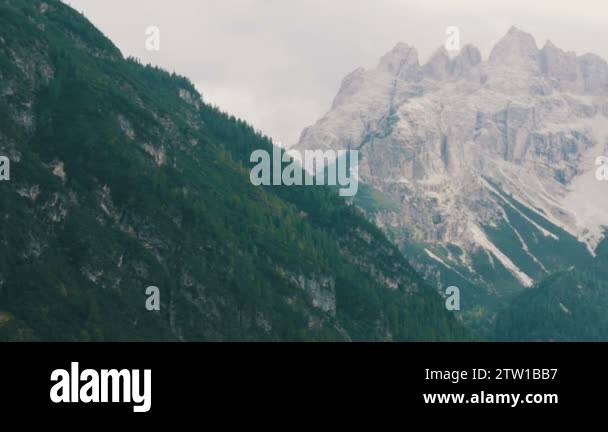 The mountains are covered with wood and stone peaks. Italian alps, the ...
