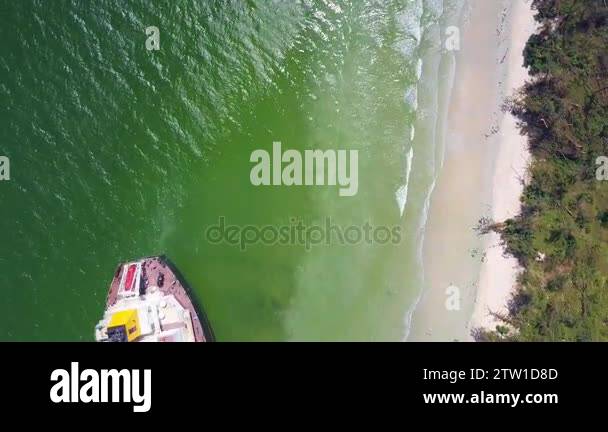 vertical aerial view pictorial azure sea washes huge tanker vessel ...