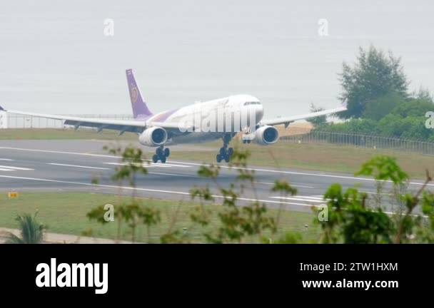 Airbus 330 landing in Phuket Stock Video Footage - Alamy