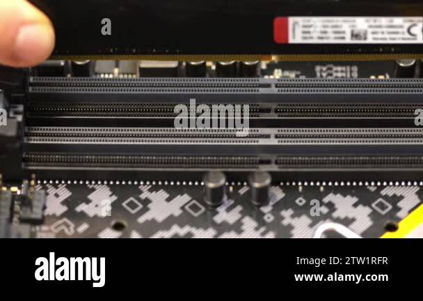Installing memory kit on pc mainboard, close up view Stock Video Footage - Alamy