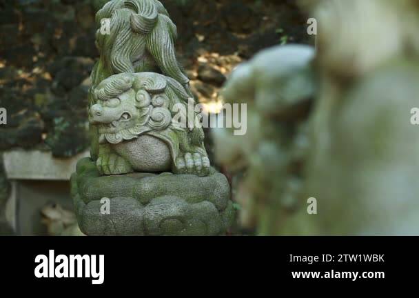 Statue guardian angel at Shinagawa shrine in Tokyo / Its a traditional ...
