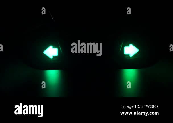 turn signal control light in car dashboard. an alarm signal on the ...