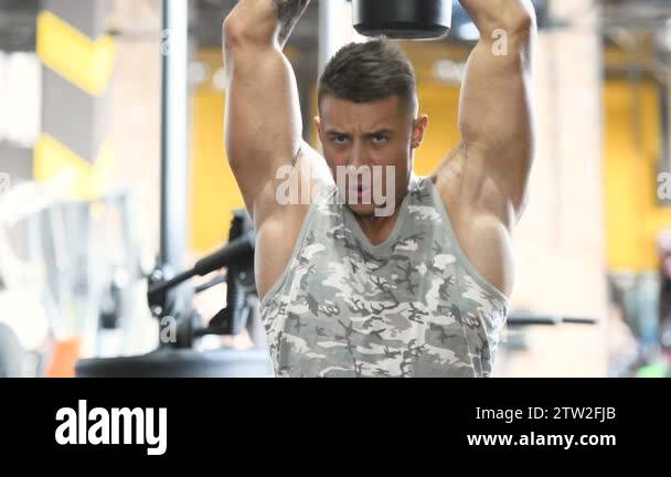 Handsome strong athletic men pumping up muscles workout fitness and ...