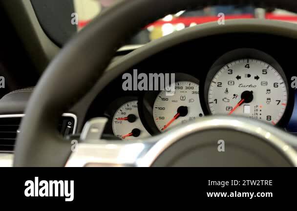 Detail of logo (wheel) and speedometer - Porsche 911 Turbo (interior ...
