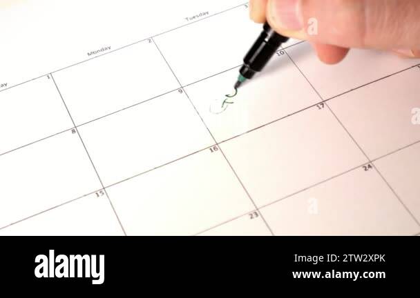 Sign the day in the calendar with a pen, draw a good bad day Stock ...