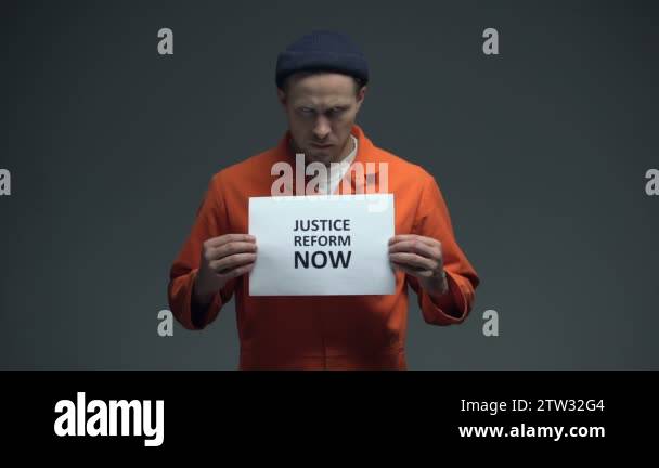 Caucasian prisoner holding justice Stock Videos & Footage - HD and 4K ...