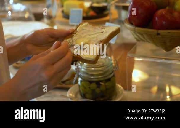 Self service took the food from the buffet line. the woman is preparing ...