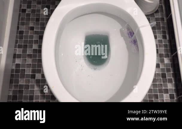 Water level raising and falling in a toilet Stock Video Footage - Alamy