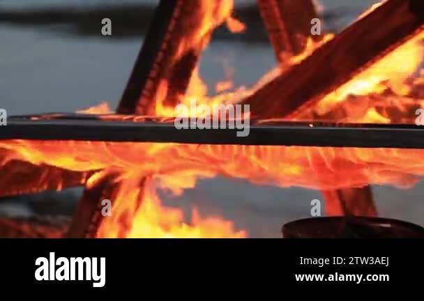 Home style video. No sound. Extreme close-up video of a burning picnic ...