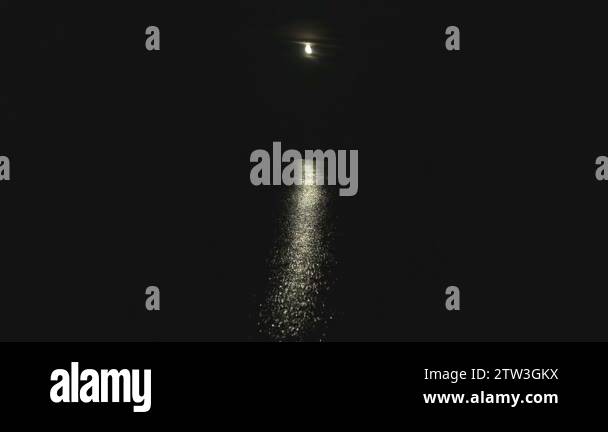 Moonlight on the water, moon track on the water, A moon track on the ...
