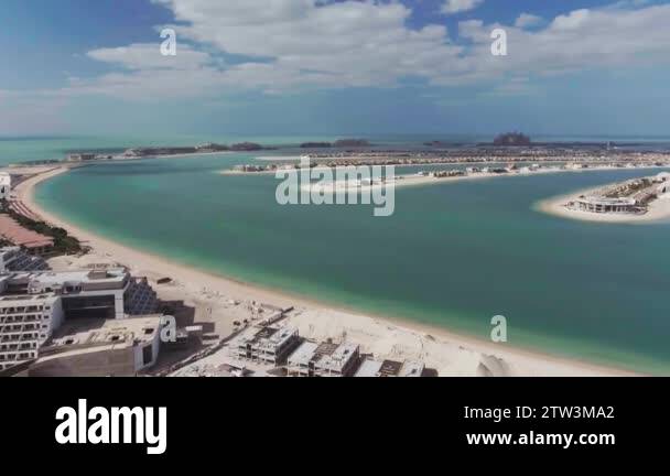 Dubai Marina skyline and Palm Jumeirah, UAE from the air Stock Video ...