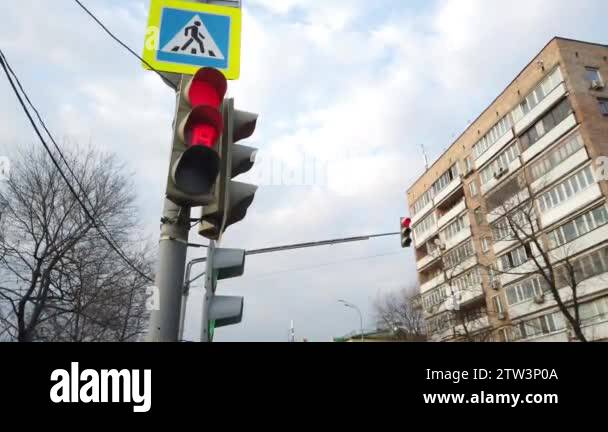 Traffic lights red, yellow, green, green arrow. Sign give way ...