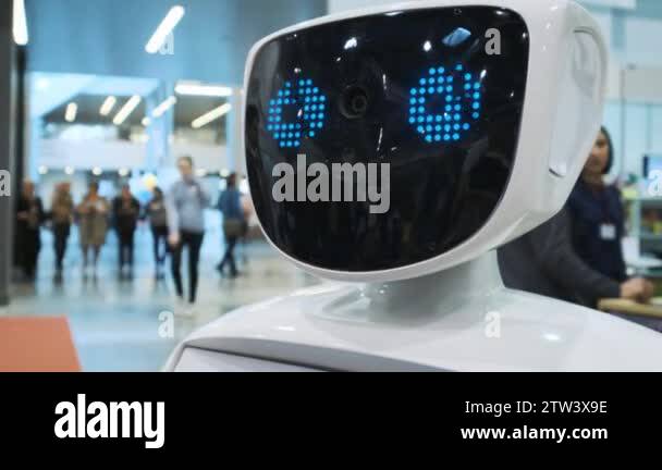 Modern Robotic Technologies. The robot looks at the camera at the ...