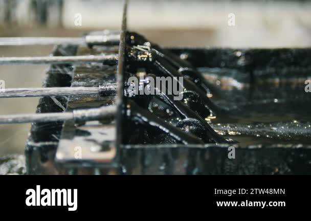 Producing of fiberglass reinforcement - the wire passes through the ...