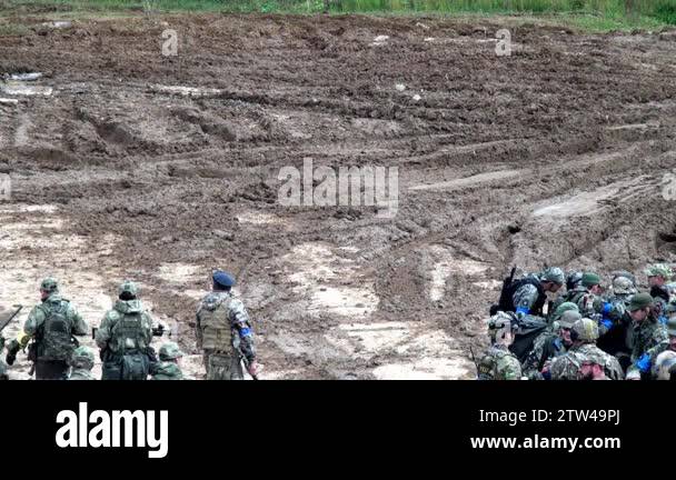 Squad of strikeball team with machine submachine guns Stock Video ...