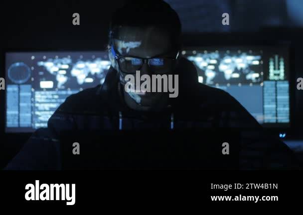 Male Hacker Programmer Working At Computer While Blue Code Characters Reflect On His Face In 1154