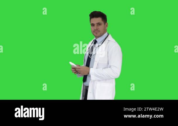 Doctor physician presenting medicine on a Green Screen, Chroma Key ...